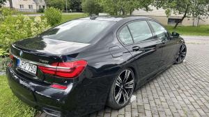 Black BMW 750 2016 in Kaunas, with an engine capacity of 4.40 L and mileage of 90 thousand km for 9750 €, photo  on AUTOMOTO.COM.LV