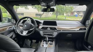 Black BMW 750 2016 in Kaunas, with an engine capacity of 4.40 L and mileage of 90 thousand km for 9750 €, photo 3 on AUTOMOTO.COM.LV