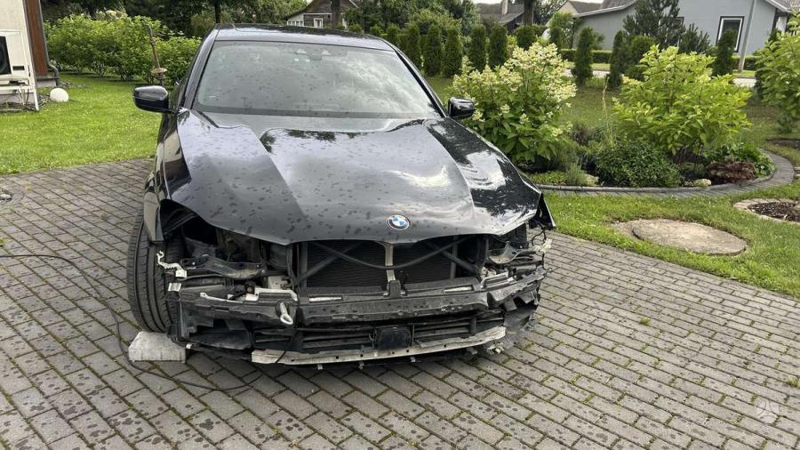 Black BMW 750 2016 in Kaunas, with an engine capacity of 4.40 L and mileage of 90 thousand km for 9750 €, photo 7 on AUTOMOTO.COM.LV