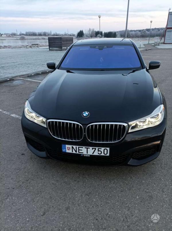 Black BMW 750 2016 in Vilnius, with an engine capacity of 4.40 L and mileage of 205 thousand km for 26000 €, photo 2 on AUTOMOTO.COM.LV