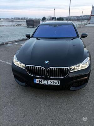 Black BMW 750 2016 in Vilnius, with an engine capacity of 4.40 L and mileage of 205 thousand km for 26000 €, photo 3 on AUTOMOTO.COM.LV