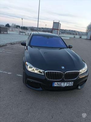 Black BMW 750 2016 in Vilnius, with an engine capacity of 4.40 L and mileage of 205 thousand km for 26000 €, photo 4 on AUTOMOTO.COM.LV