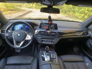 Black BMW 750 2016 in Vilnius, with an engine capacity of 4.40 L and mileage of 205 thousand km for 26000 €, photo 14 on AUTOMOTO.COM.LV