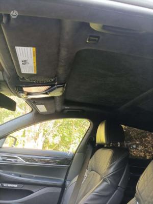 Black BMW 750 2016 in Vilnius, with an engine capacity of 4.40 L and mileage of 205 thousand km for 26000 €, photo 23 on AUTOMOTO.COM.LV