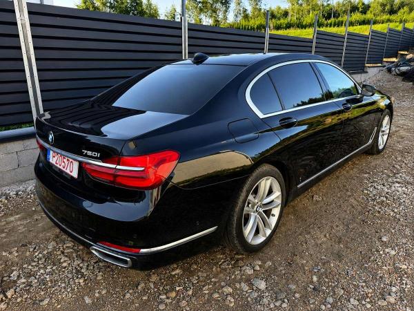 Black BMW 750 2016 in Vilnius, with an engine capacity of 4.40 L and mileage of 255 thousand km for 12999 €, photo 2 on AUTOMOTO.COM.LV