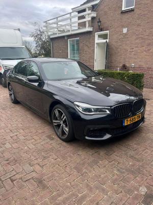 Black BMW 750 2017 in Ukmerge, with an engine capacity of 2.99 L and mileage of 300 thousand km for 14850 €, photo 2 on AUTOMOTO.COM.LV