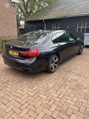 Black BMW 750 2017 in Ukmerge, with an engine capacity of 2.99 L and mileage of 300 thousand km for 14850 €, photo 3 on AUTOMOTO.COM.LV