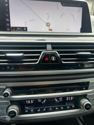 Black BMW 750 2017 in Ukmerge, with an engine capacity of 2.99 L and mileage of 300 thousand km for 14850 €, photo 8 on AUTOMOTO.COM.LV