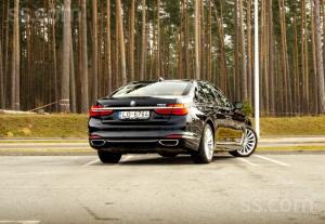 Black BMW 750 2017 in Riga, with an engine capacity of 4.40 L and mileage of 127 thousand km for 28590 €, photo 6 on AUTOMOTO.COM.LV