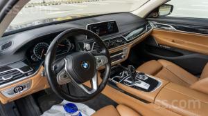 Black BMW 750 2017 in Riga, with an engine capacity of 4.40 L and mileage of 127 thousand km for 28590 €, photo 10 on AUTOMOTO.COM.LV