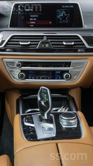 Black BMW 750 2017 in Riga, with an engine capacity of 4.40 L and mileage of 127 thousand km for 28590 €, photo 13 on AUTOMOTO.COM.LV