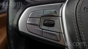 Black BMW 750 2017 in Riga, with an engine capacity of 4.40 L and mileage of 127 thousand km for 28590 €, photo 21 on AUTOMOTO.COM.LV