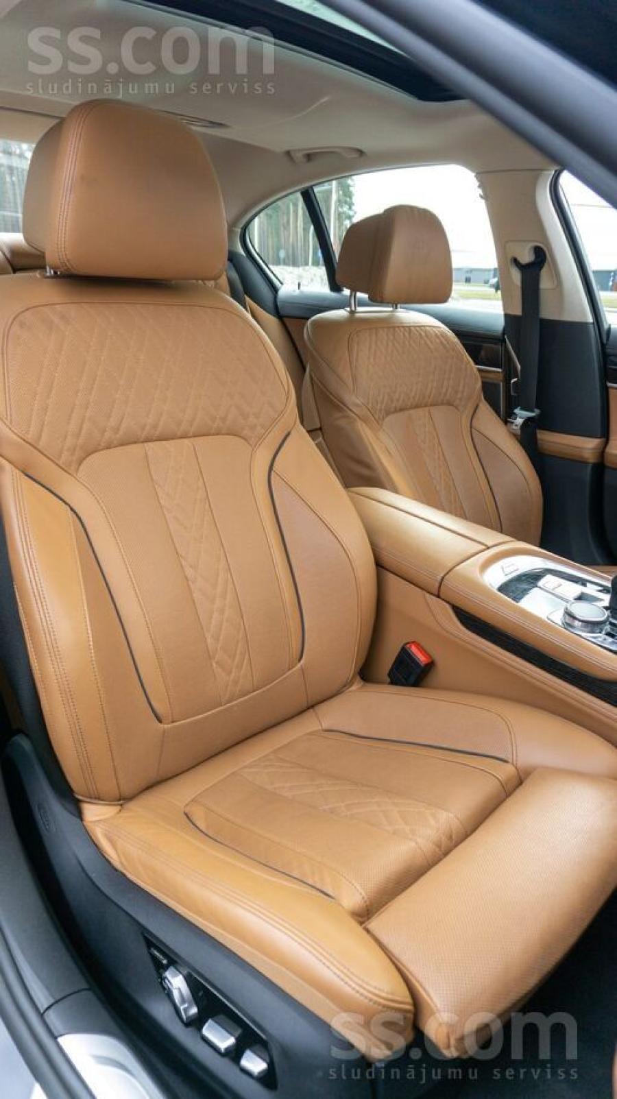 Black BMW 750 2017 in Riga, with an engine capacity of 4.40 L and mileage of 127 thousand km for 28590 €, photo 32 on AUTOMOTO.COM.LV