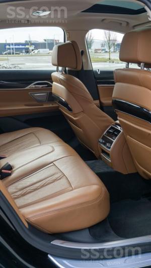 Black BMW 750 2017 in Riga, with an engine capacity of 4.40 L and mileage of 127 thousand km for 28590 €, photo 33 on AUTOMOTO.COM.LV