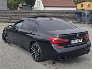 Black BMW 750 2017 in Silute, with an engine capacity of 4.40 L and mileage of 190 thousand km for 20000 €, photo 5 on AUTOMOTO.COM.LV