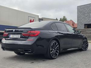 Black BMW 750 2017 in Silute, with an engine capacity of 4.40 L and mileage of 190 thousand km for 20000 €, photo 10 on AUTOMOTO.COM.LV