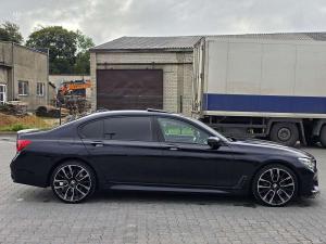Black BMW 750 2017 in Silute, with an engine capacity of 4.40 L and mileage of 190 thousand km for 20000 €, photo 11 on AUTOMOTO.COM.LV