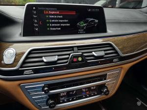 Black BMW 750 2017 in Silute, with an engine capacity of 4.40 L and mileage of 190 thousand km for 20000 €, photo 18 on AUTOMOTO.COM.LV