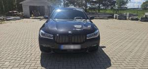 Black BMW 750 2018 in Vilnius, with an engine capacity of 4.40 L and mileage of 150 thousand km for 29990 €, photo 4 on AUTOMOTO.COM.LV