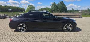 Black BMW 750 2018 in Vilnius, with an engine capacity of 4.40 L and mileage of 150 thousand km for 29990 €, photo 6 on AUTOMOTO.COM.LV