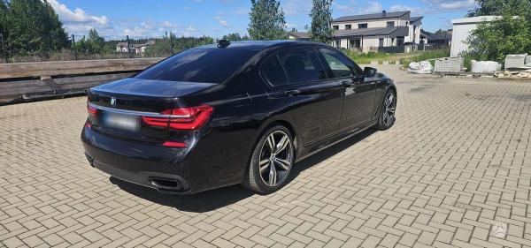 Black BMW 750 2018 in Vilnius, with an engine capacity of 4.40 L and mileage of 150 thousand km for 29990 €, photo 6 on AUTOMOTO.COM.LV