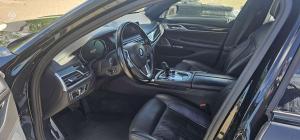 Black BMW 750 2018 in Vilnius, with an engine capacity of 4.40 L and mileage of 150 thousand km for 29990 €, photo 10 on AUTOMOTO.COM.LV