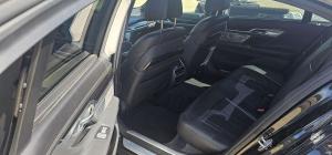 Black BMW 750 2018 in Vilnius, with an engine capacity of 4.40 L and mileage of 150 thousand km for 29990 €, photo 15 on AUTOMOTO.COM.LV