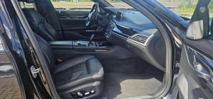 Black BMW 750 2018 in Vilnius, with an engine capacity of 4.40 L and mileage of 150 thousand km for 29990 €, photo 18 on AUTOMOTO.COM.LV