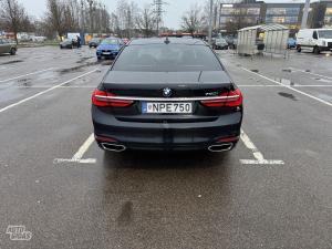 Black BMW 750 2019 in Kaunas, with an engine capacity of 4.40 L and mileage of 76 thousand km for 28500 €, photo 6 on AUTOMOTO.COM.LV