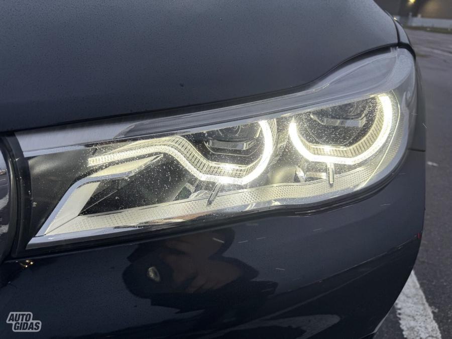 Black BMW 750 2019 in Kaunas, with an engine capacity of 4.40 L and mileage of 76 thousand km for 28500 €, photo 14 on AUTOMOTO.COM.LV