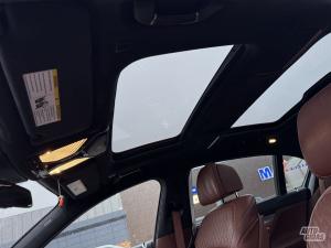 Black BMW 750 2019 in Kaunas, with an engine capacity of 4.40 L and mileage of 76 thousand km for 28500 €, photo 20 on AUTOMOTO.COM.LV