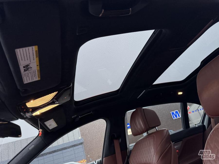 Black BMW 750 2019 in Kaunas, with an engine capacity of 4.40 L and mileage of 76 thousand km for 28500 €, photo 20 on AUTOMOTO.COM.LV