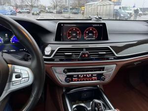 Black BMW 750 2019 in Kaunas, with an engine capacity of 4.40 L and mileage of 76 thousand km for 28500 €, photo 23 on AUTOMOTO.COM.LV