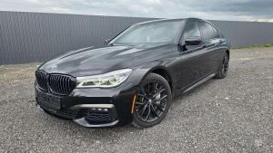 Black BMW 750 2019 in Raseiniai, with an engine capacity of 4.40 L and mileage of 122 thousand km for 19999 €, photo  on AUTOMOTO.COM.LV