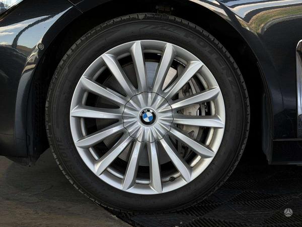 Black BMW 750 2019 in Kaunas, with an engine capacity of 2.99 L and mileage of 125 thousand km for 34990 €, photo 7 on AUTOMOTO.COM.LV