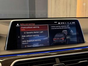 Black BMW 750 2019 in Kaunas, with an engine capacity of 2.99 L and mileage of 125 thousand km for 34990 €, photo 35 on AUTOMOTO.COM.LV