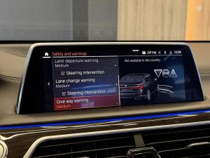 Black BMW 750 2019 in Kaunas, with an engine capacity of 2.99 L and mileage of 125 thousand km for 34990 €, photo 36 on AUTOMOTO.COM.LV
