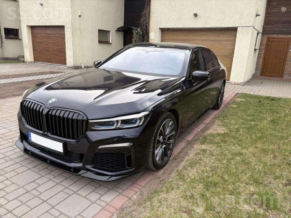 Black BMW 750 2020 in Riga, with an engine capacity of 4.40 L and mileage of 70 thousand km for 47000 €, photo 2 on AUTOMOTO.COM.LV