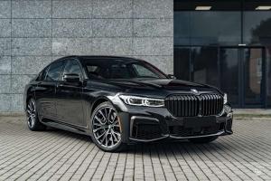 Black BMW 750 2020 in Klaipeda, with an engine capacity of 4.40 L and mileage of 59 thousand km for 39850 €, photo  on AUTOMOTO.COM.LV