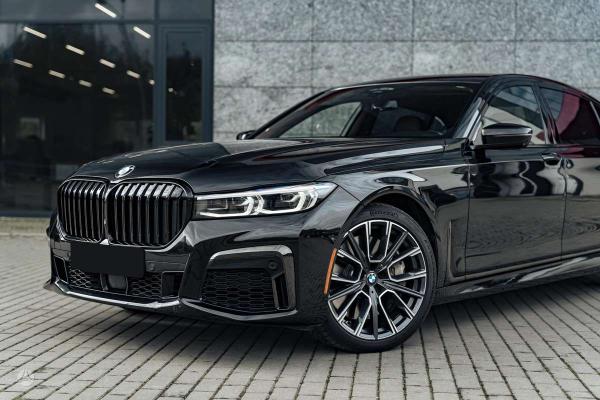 Black BMW 750 2020 in Klaipeda, with an engine capacity of 4.40 L and mileage of 59 thousand km for 39850 €, photo 6 on AUTOMOTO.COM.LV