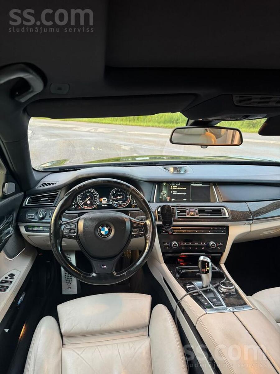 Blue BMW 750 2013 in Madona, with an engine capacity of 3.00 L and mileage of 298 thousand km for 14500 €, photo 6 on AUTOMOTO.COM.LV