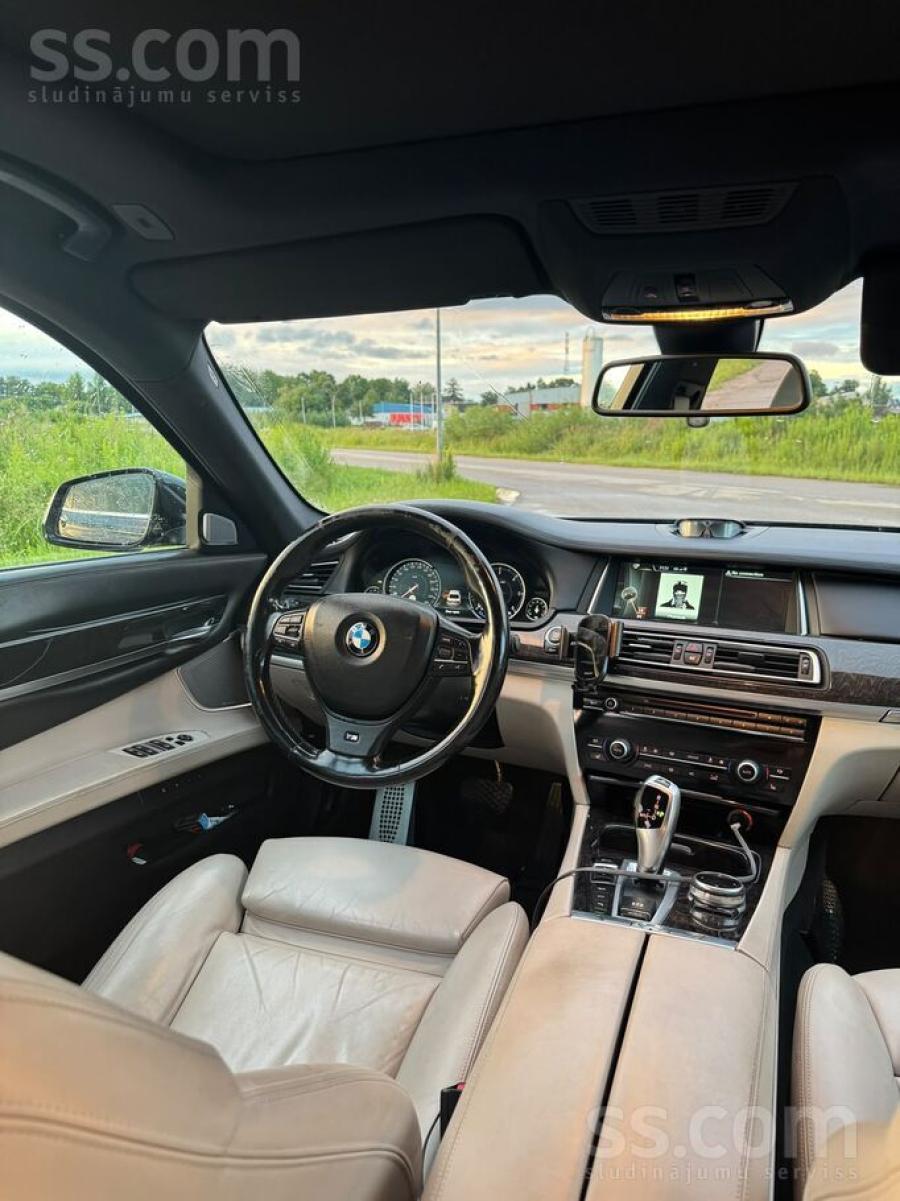 Blue BMW 750 2013 in Madona, with an engine capacity of 3.00 L and mileage of 298 thousand km for 14500 €, photo 8 on AUTOMOTO.COM.LV