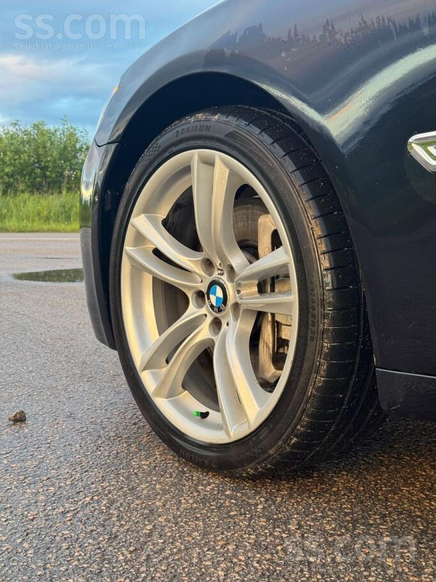 Blue BMW 750 2013 in Madona, with an engine capacity of 3.00 L and mileage of 298 thousand km for 14500 €, photo 9 on AUTOMOTO.COM.LV