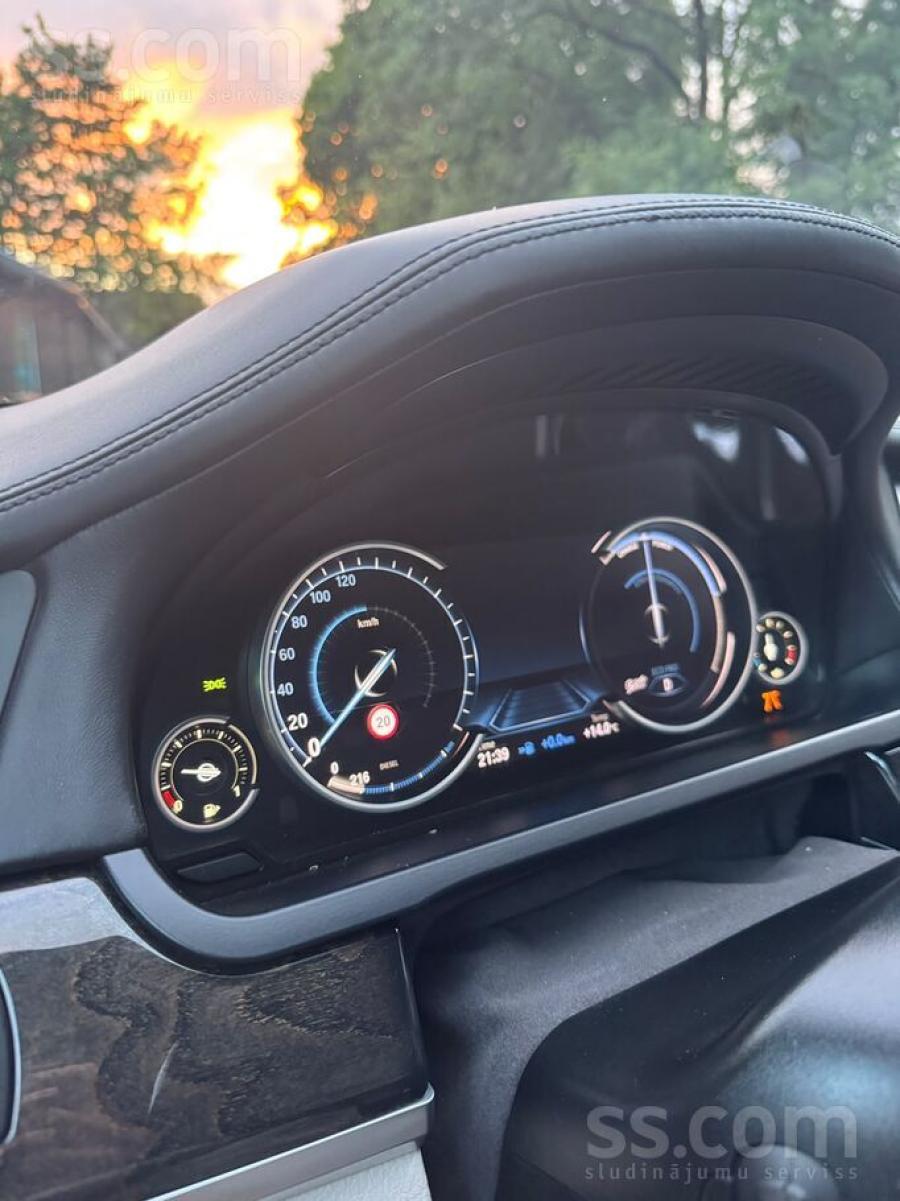 Blue BMW 750 2013 in Madona, with an engine capacity of 3.00 L and mileage of 298 thousand km for 14500 €, photo 12 on AUTOMOTO.COM.LV