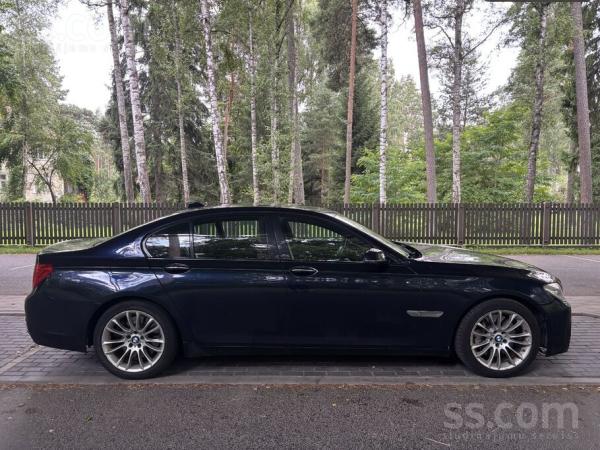 Blue BMW 750 2013 in Jurmala, with an engine capacity of 4.40 L and mileage of 225 thousand km for 11700 €, photo 7 on AUTOMOTO.COM.LV