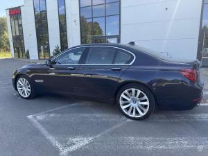 Blue BMW 750 2015 in Kaunas, with an engine capacity of 2.99 L and mileage of 126 thousand km for 15650 €, photo 6 on AUTOMOTO.COM.LV