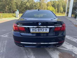 Blue BMW 750 2015 in Kaunas, with an engine capacity of 2.99 L and mileage of 126 thousand km for 15650 €, photo 9 on AUTOMOTO.COM.LV