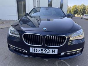 Blue BMW 750 2015 in Kaunas, with an engine capacity of 2.99 L and mileage of 126 thousand km for 15650 €, photo 12 on AUTOMOTO.COM.LV