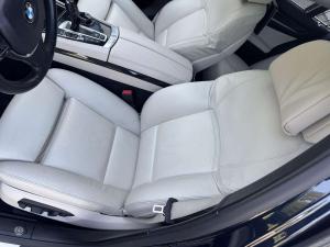 Blue BMW 750 2015 in Kaunas, with an engine capacity of 2.99 L and mileage of 126 thousand km for 15650 €, photo 16 on AUTOMOTO.COM.LV