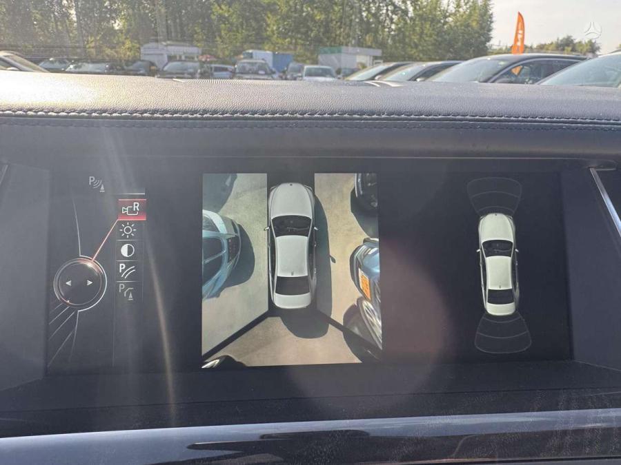 Blue BMW 750 2015 in Kaunas, with an engine capacity of 2.99 L and mileage of 126 thousand km for 15650 €, photo 21 on AUTOMOTO.COM.LV
